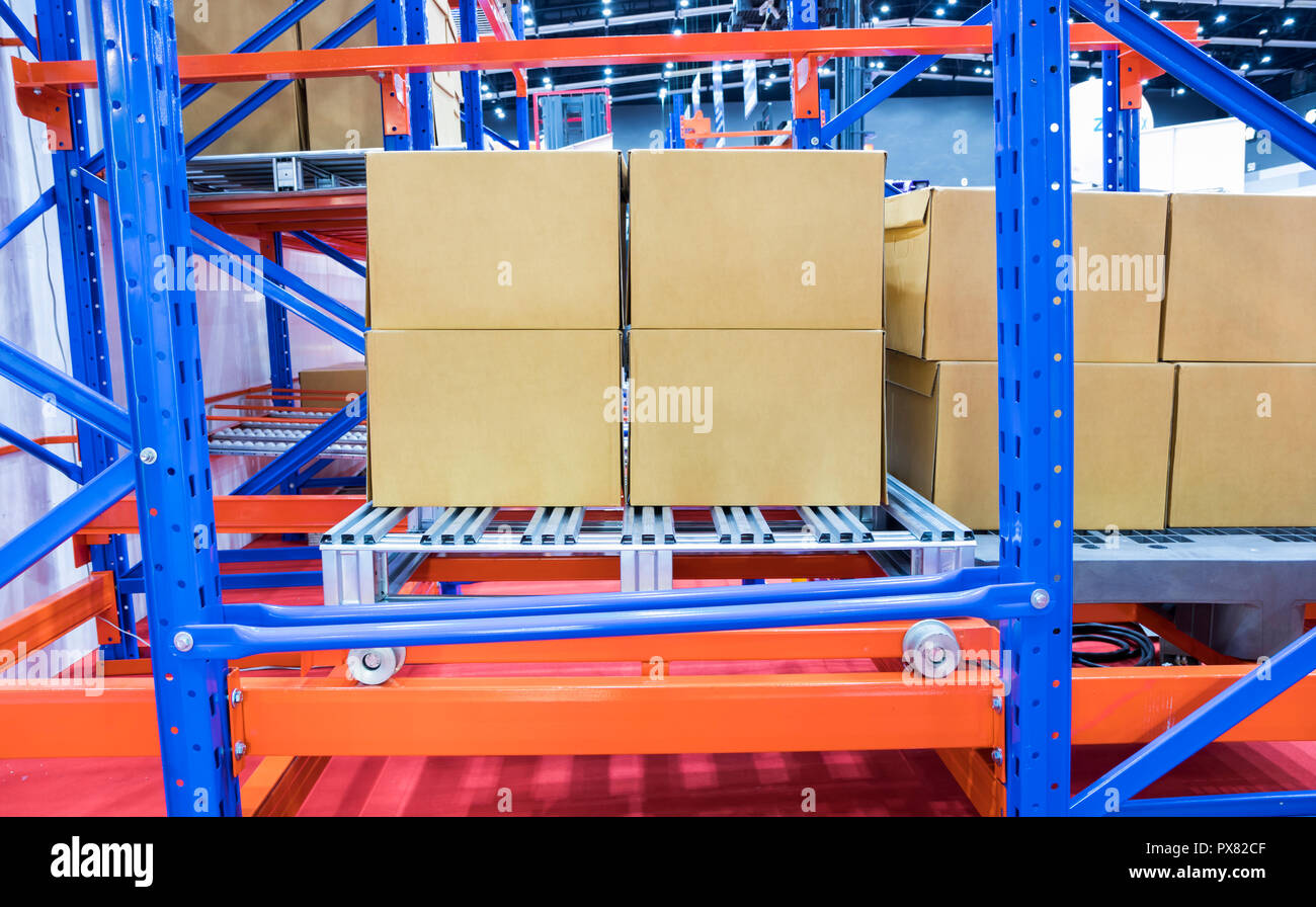 row of cotton boxes kept in warehouse shelves ; logistics Stock Photo ...