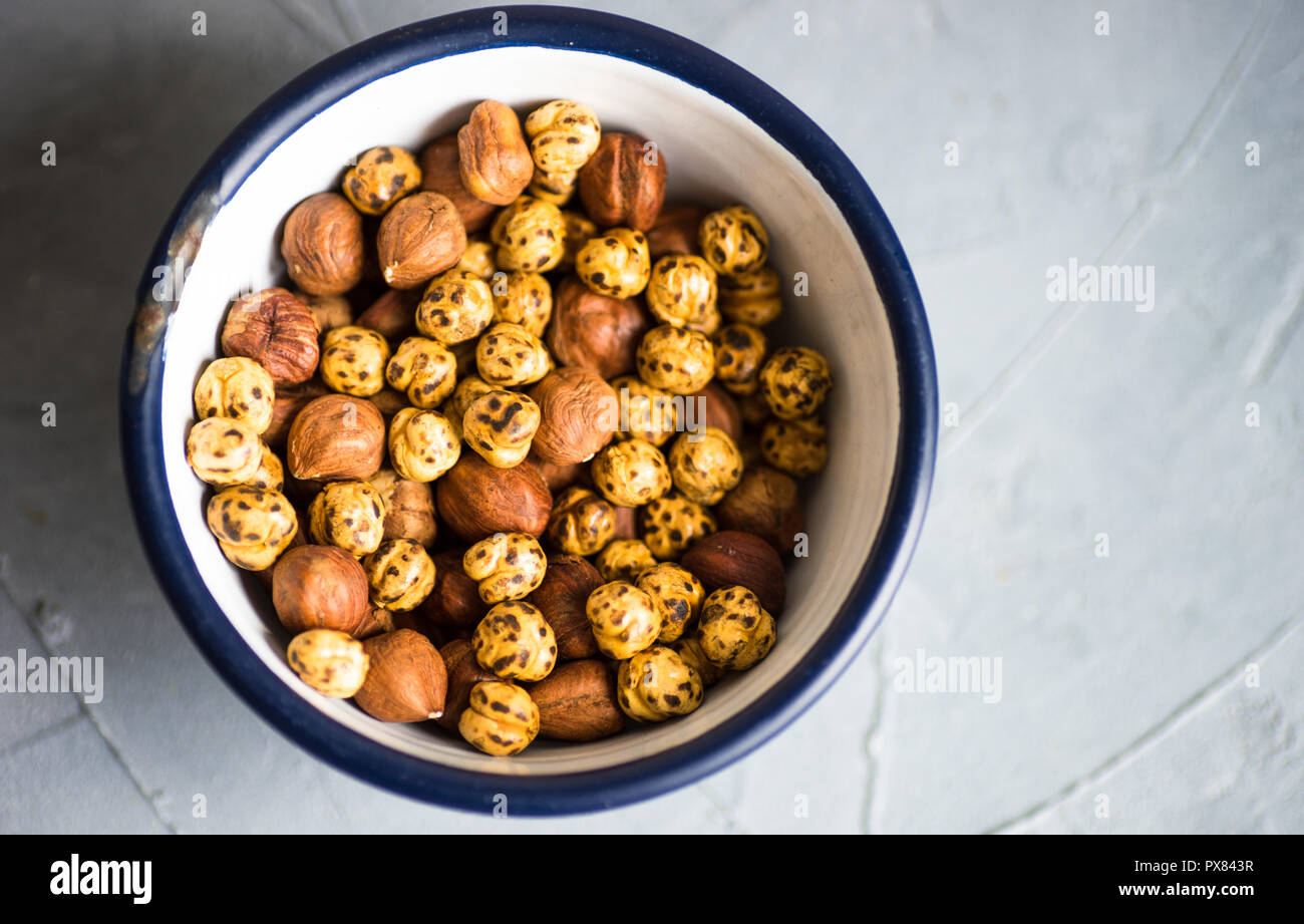 Different types of nuts in a bowl as a snack food concept Stock Photo ...