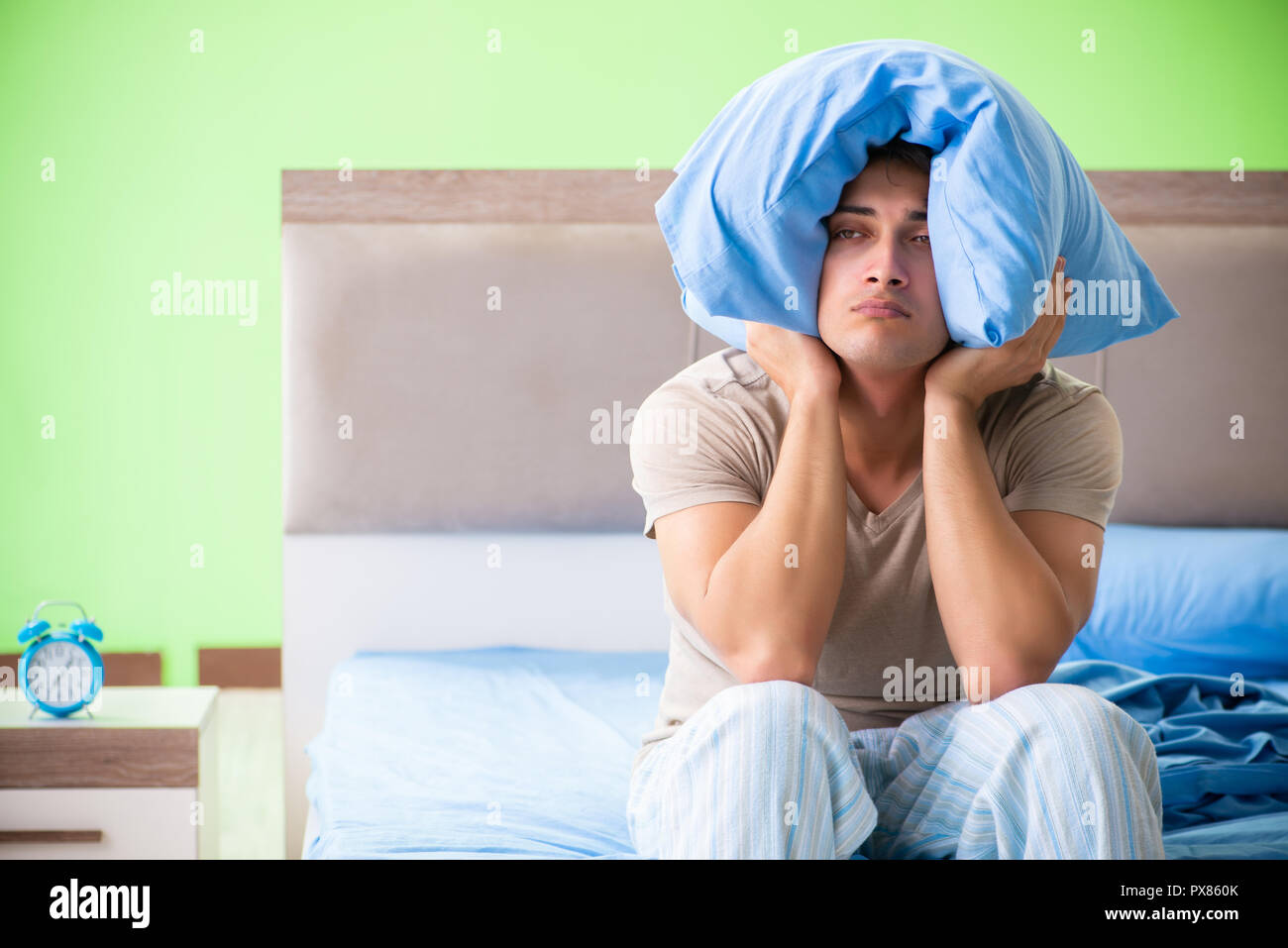 Man suffering from sleeping disorder and insomnia Stock Photo - Alamy