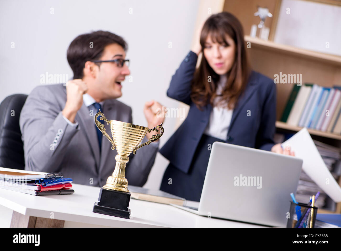 Concept of teamwork with prize Stock Photo - Alamy