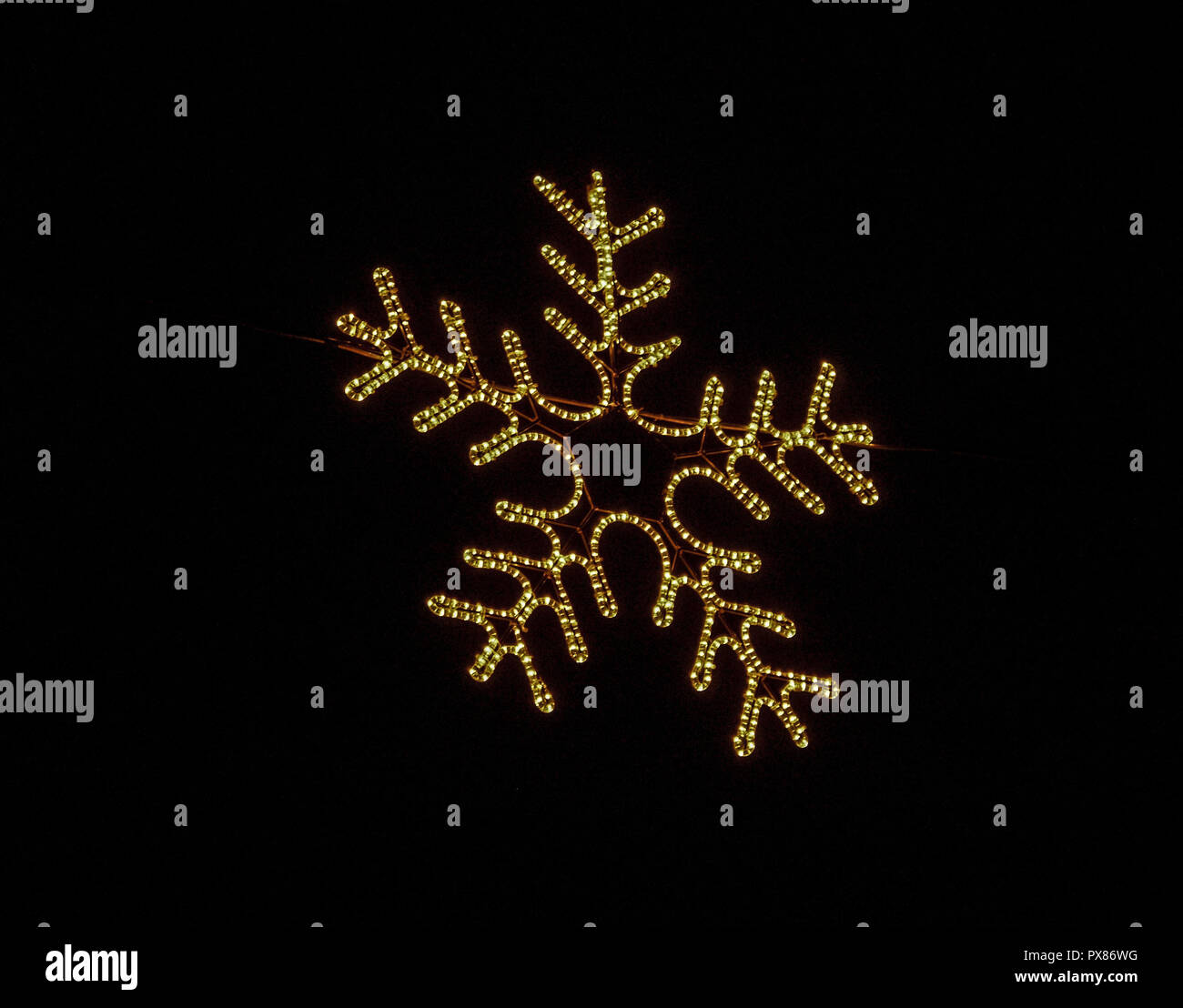 Neon light snow flake Stock Photo - Alamy