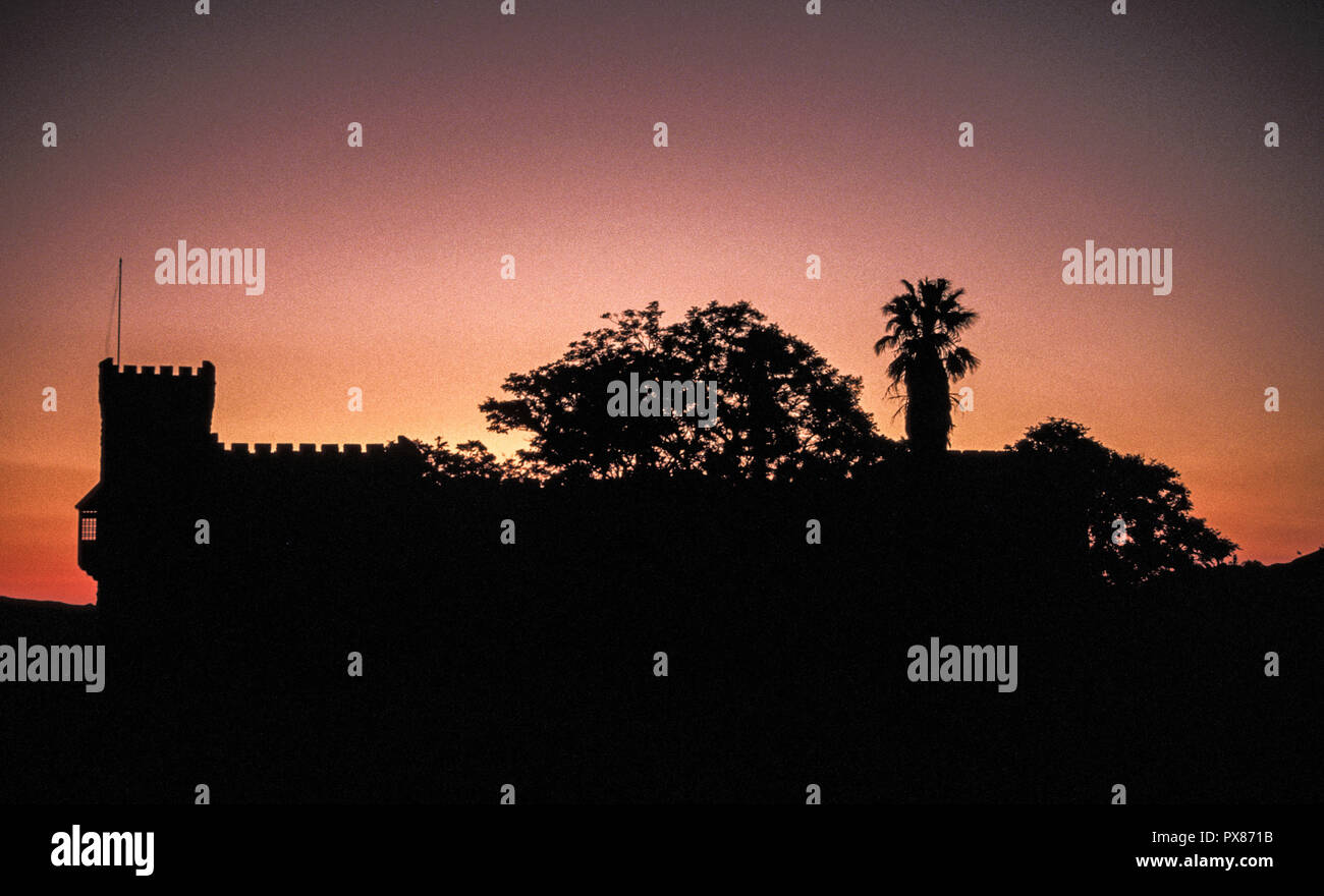 Silhouette of a castle in the sunset, Namibia, castle Duwiseb Stock ...