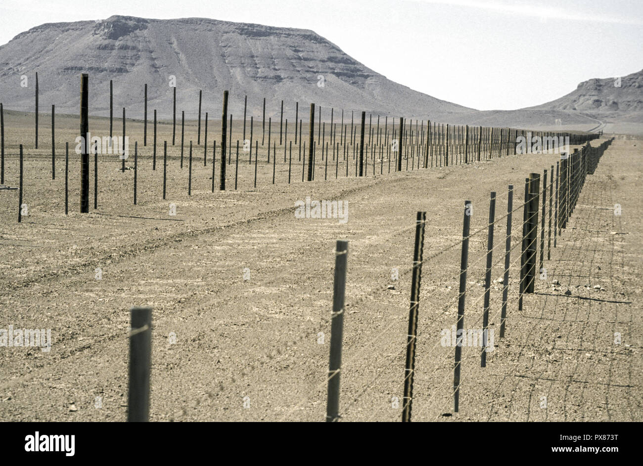 Fence line in the desert, Namibia Stock Photo - Alamy