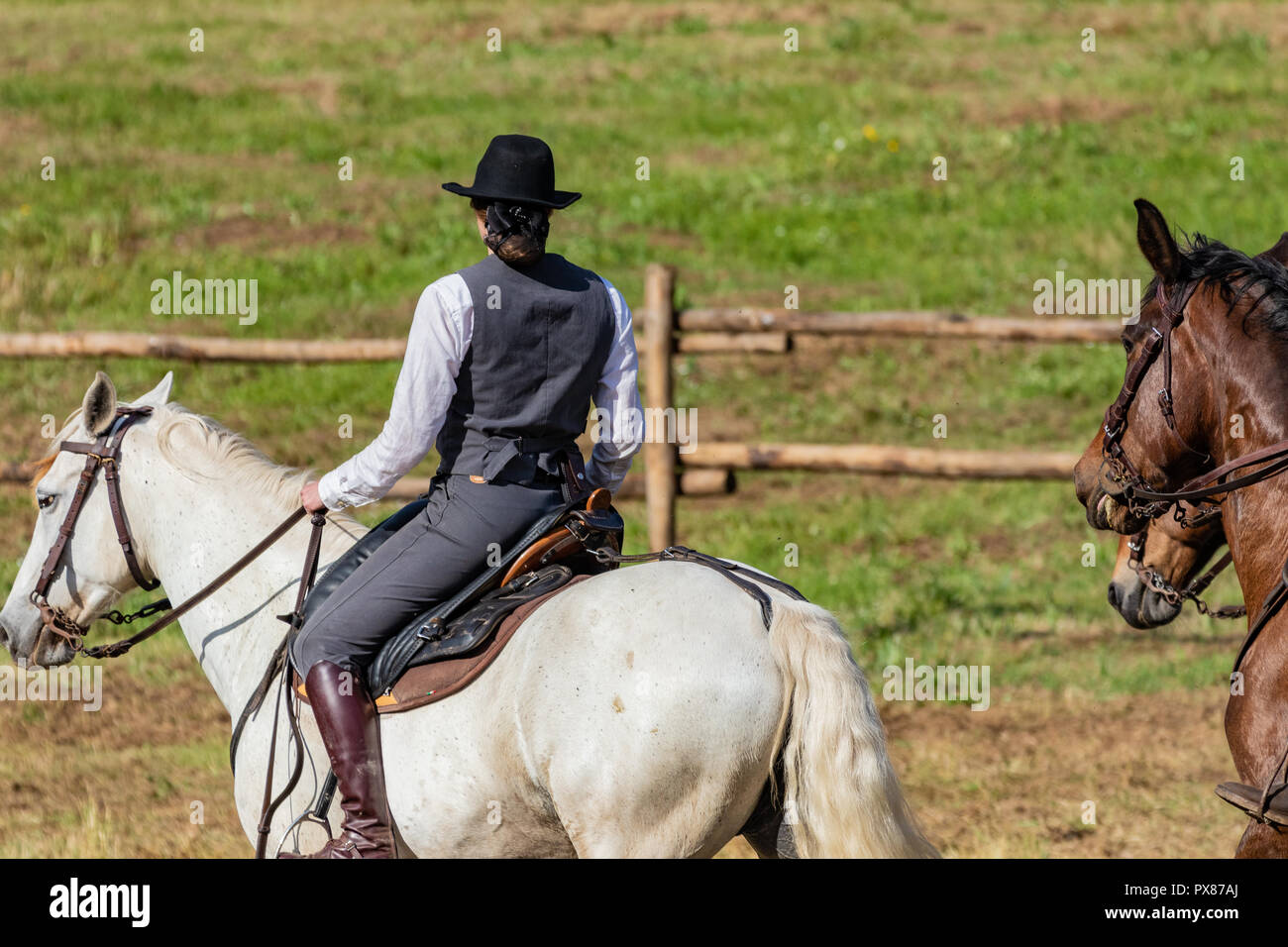 Female horse rider, leading a hunting party during a traditional ...