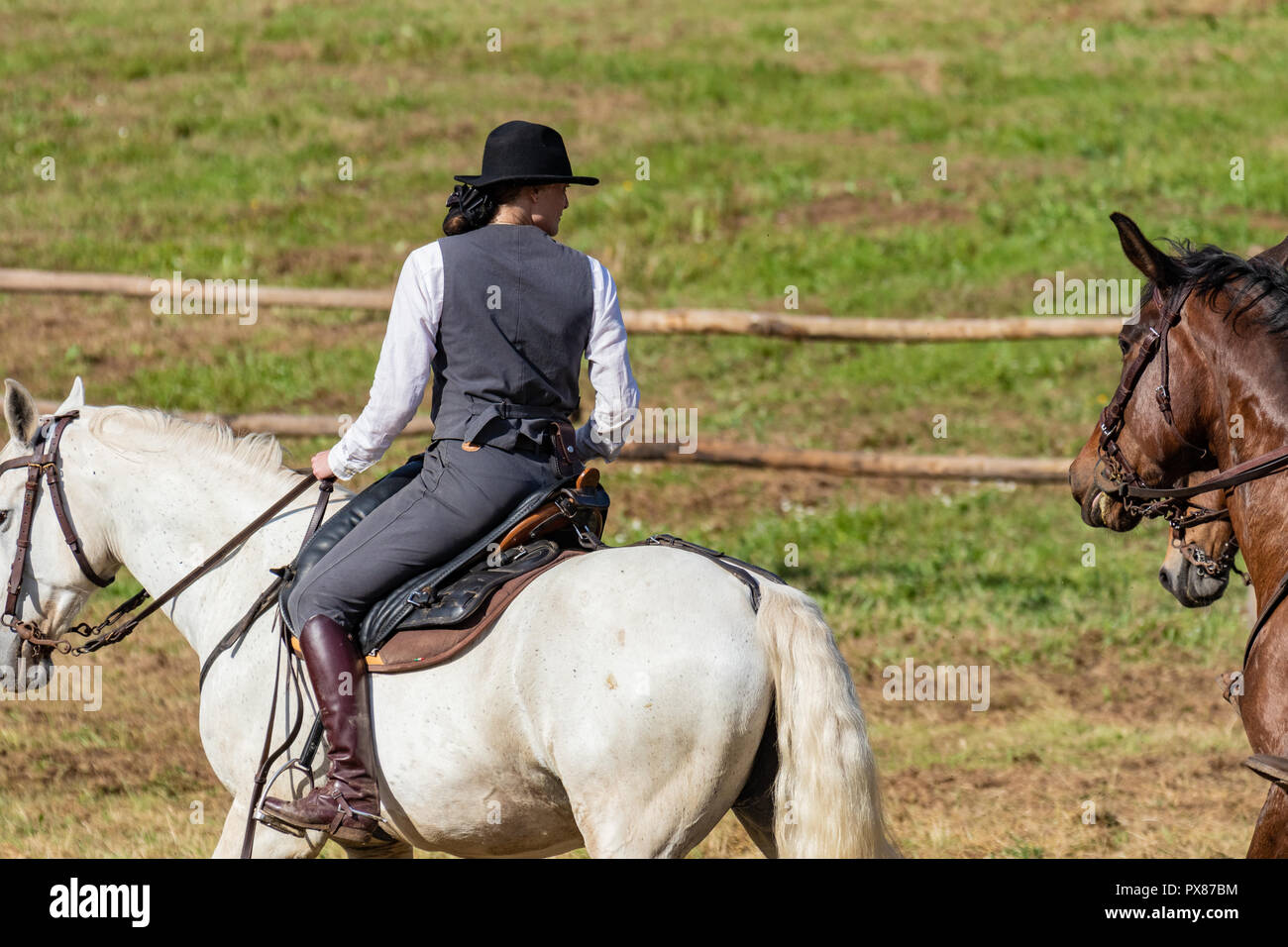 Female horse rider, leading a hunting party during a traditional ...