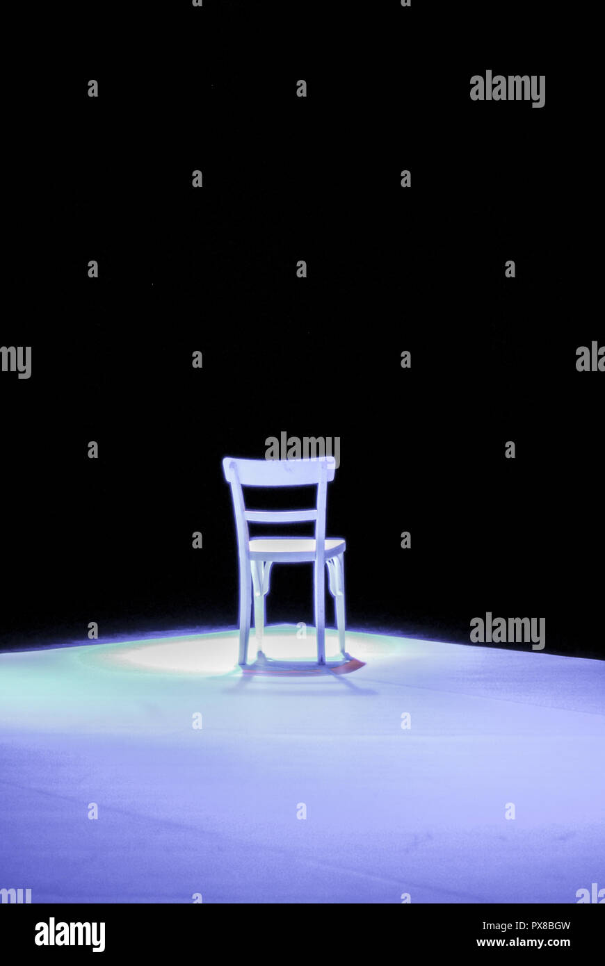 Chair in stage light, shadow Stock Photo - Alamy