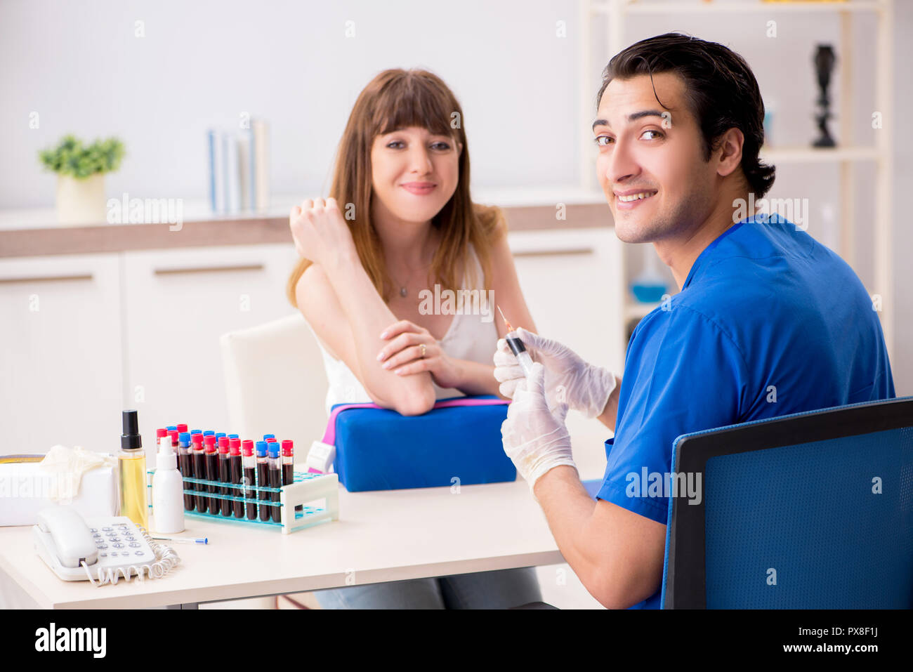 Young patient during blood test sampling procedure Stock Photo - Alamy