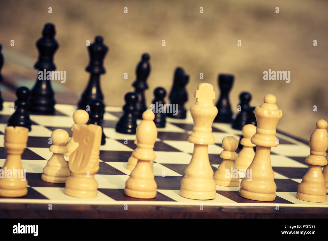 Close up chess pieces on board. Selective focus on white pieces Stock ...
