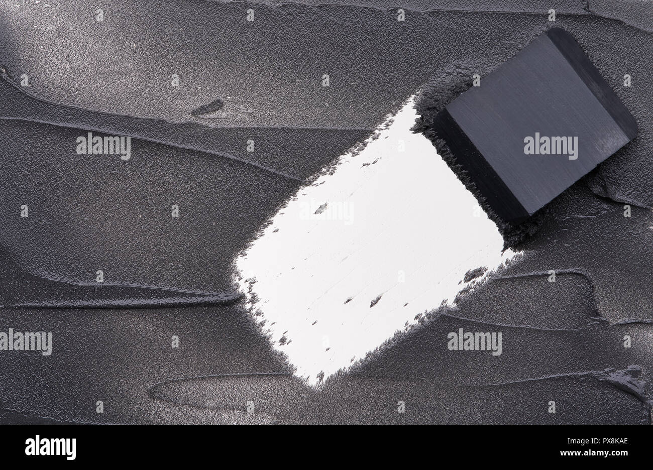 Black smear of magnetic face mask on a white background Stock Photo - Alamy