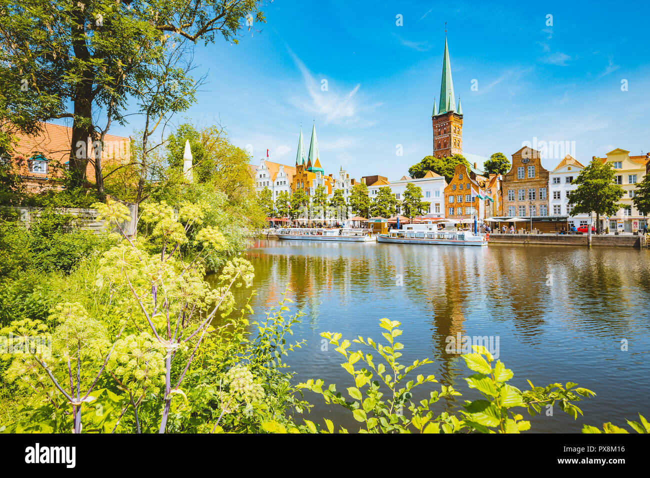 Classic panorama view of the historic city of Luebeck with famous Trave ...