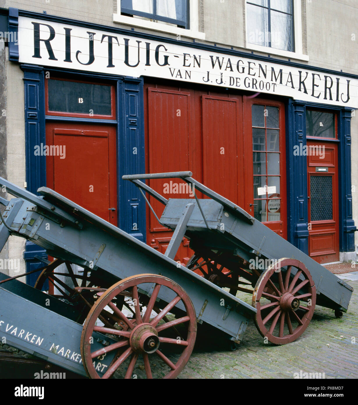 Very old fashioned traditional handcart and carriage factory in Leiden ...