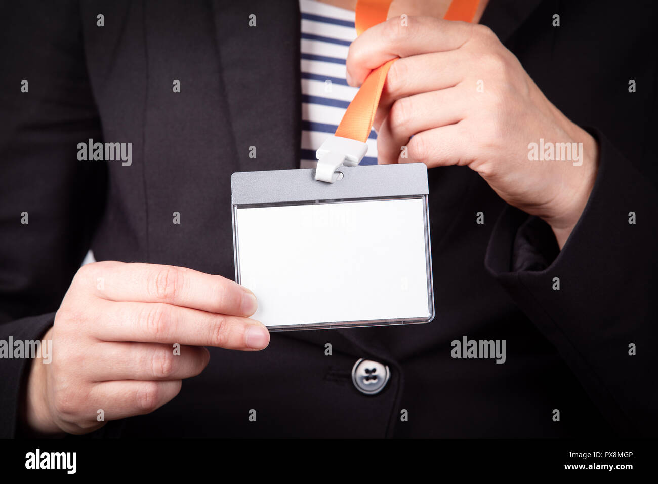 White empty staff identity mockup with orange lanyard Stock Photo - Alamy