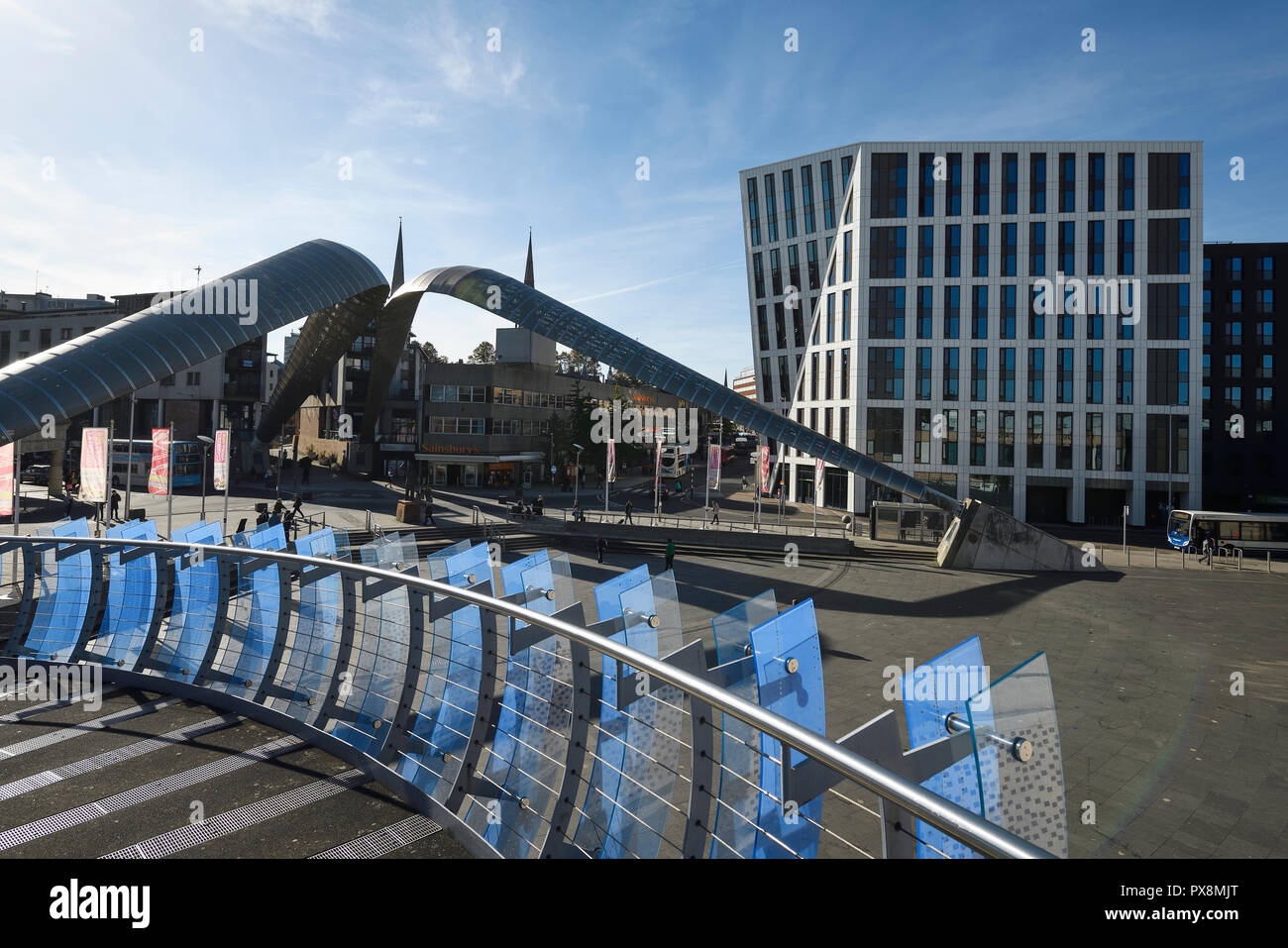 The pedestrian Glass Bridge and Whittle Arch sculpture in Coventry city ...