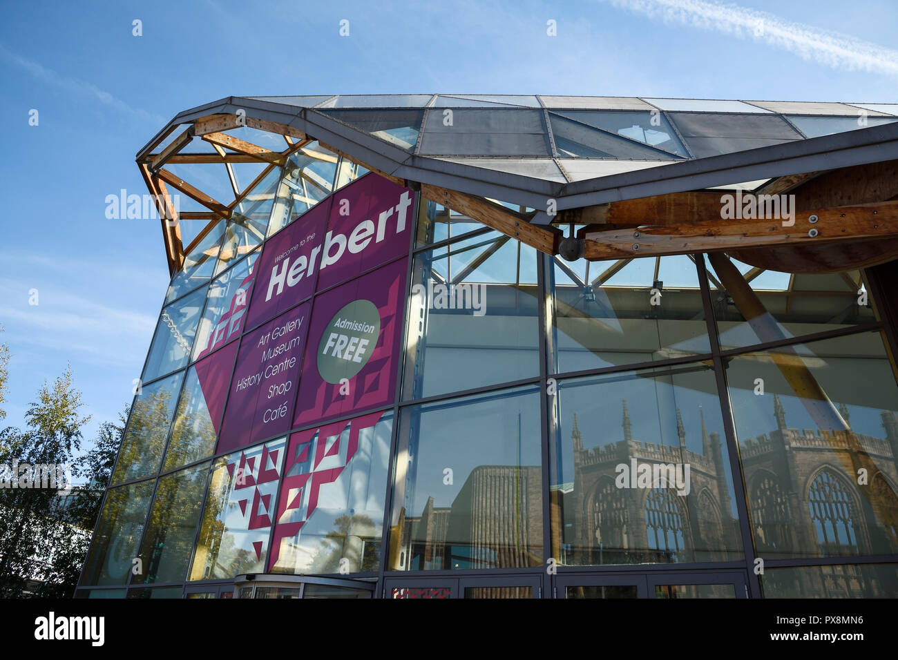 Coventry Cathedral reflected in the Herbert Art Gallery and Museum in ...