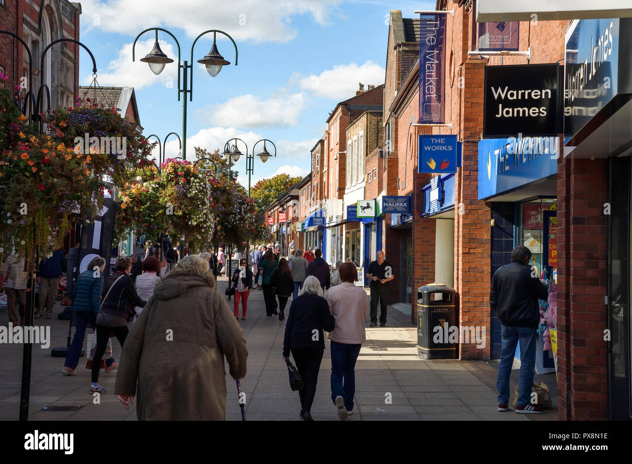 Town centre shops on pedestrianised Victoria Street in Crewe town ...