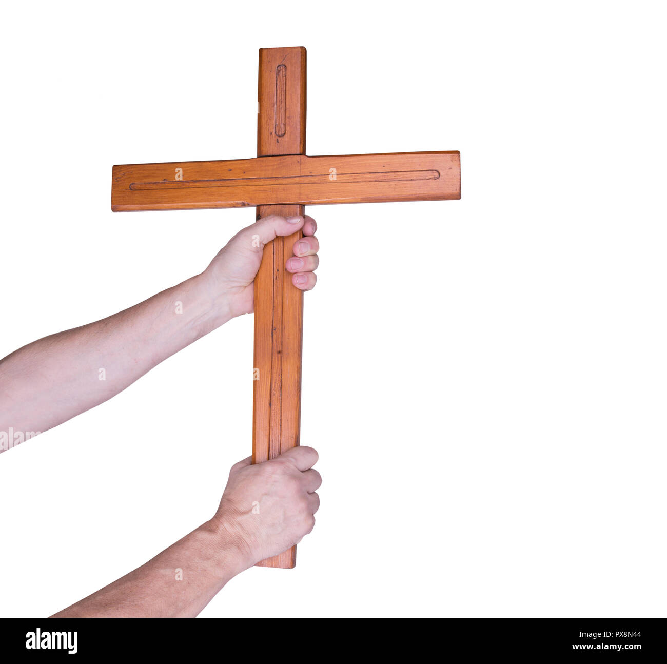 Christian man holding a cross with faith in God Stock Photo - Alamy