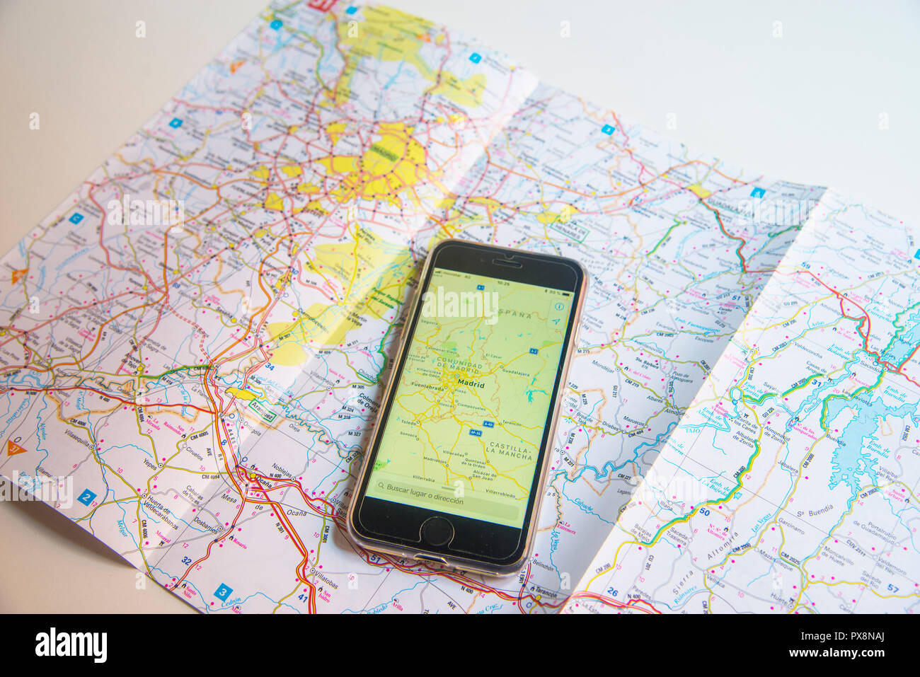 Smartphone and road map showing the same map Stock Photo - Alamy