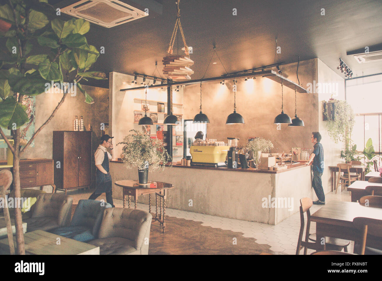 Beautiful cafe interior with tables and chairs and lighting Stock Photo ...