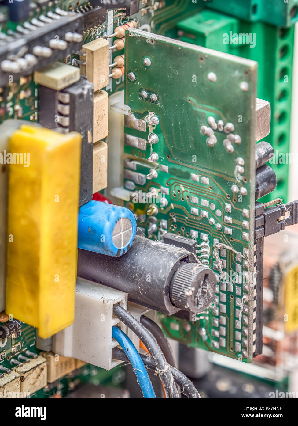 Printed circuit board with different electronics elements inside the ...