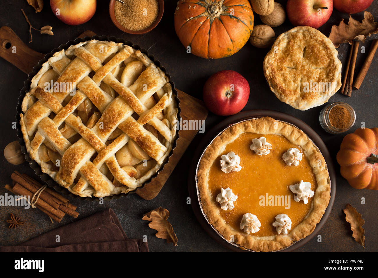 Thanksgiving pumpkin and apple various pies, top view. Fall traditional ...