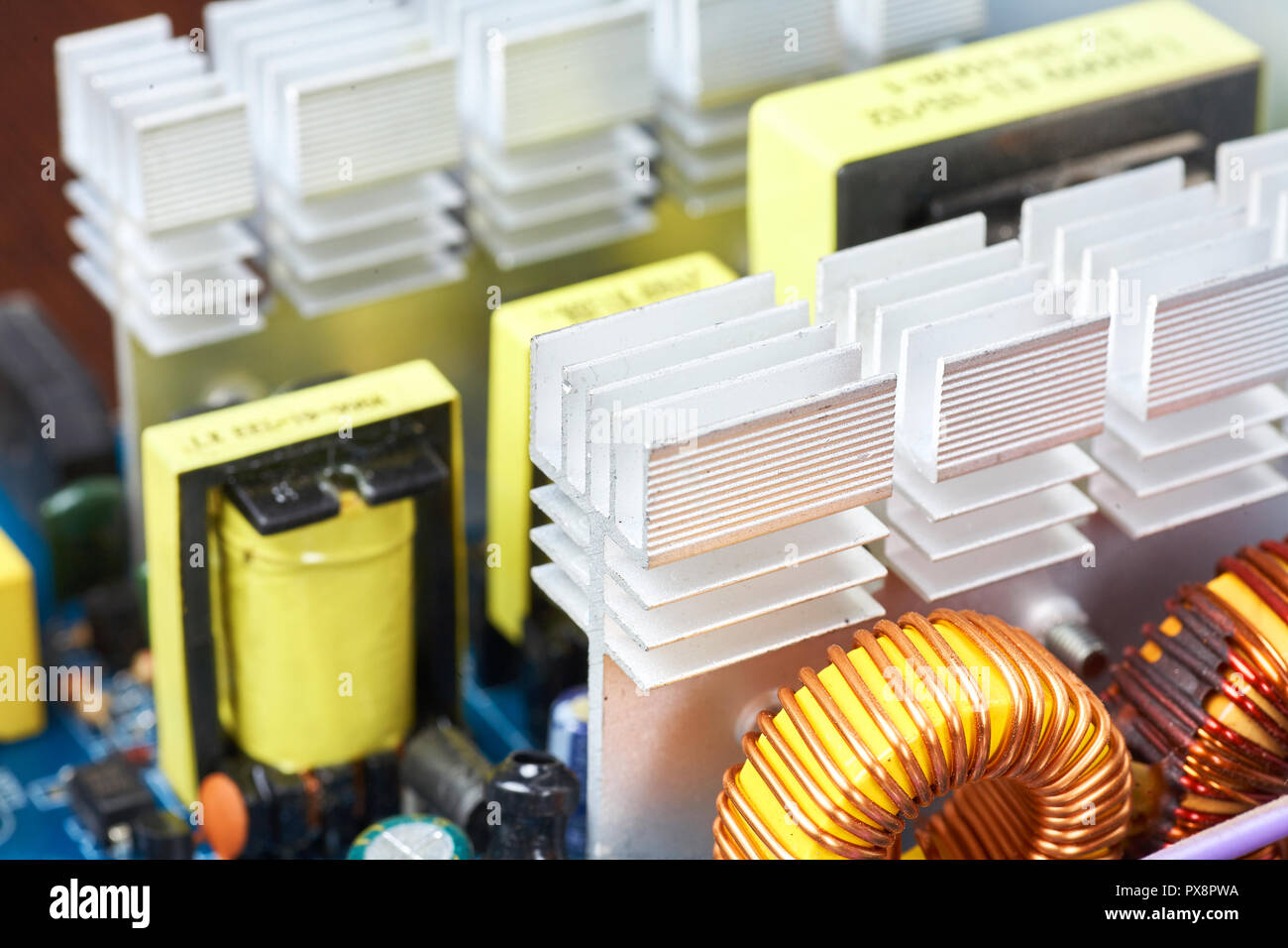 Microchip, capacitors, resistors on a computer board close-up ...