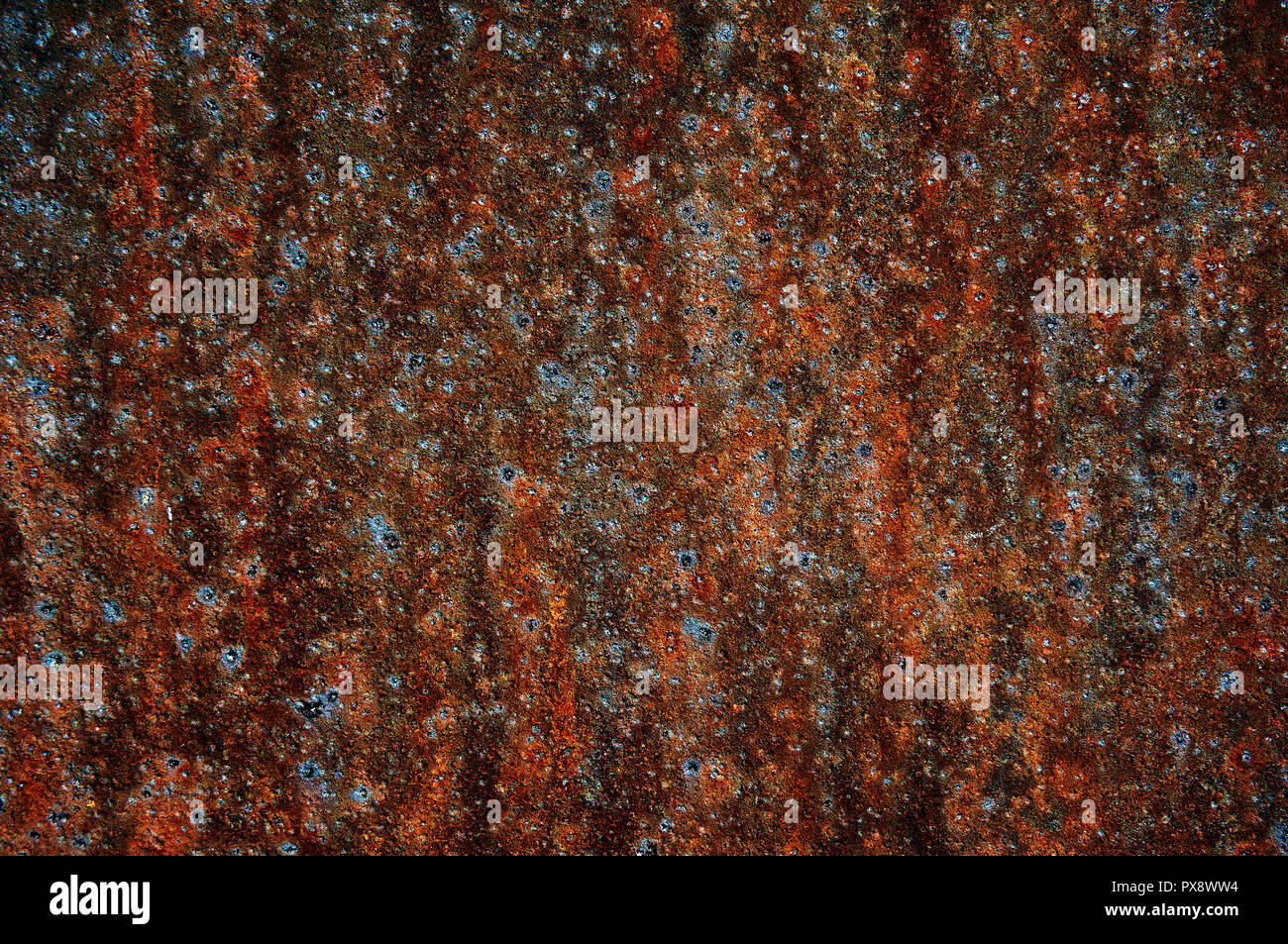 Rusted iron. Dark background Stock Photo - Alamy
