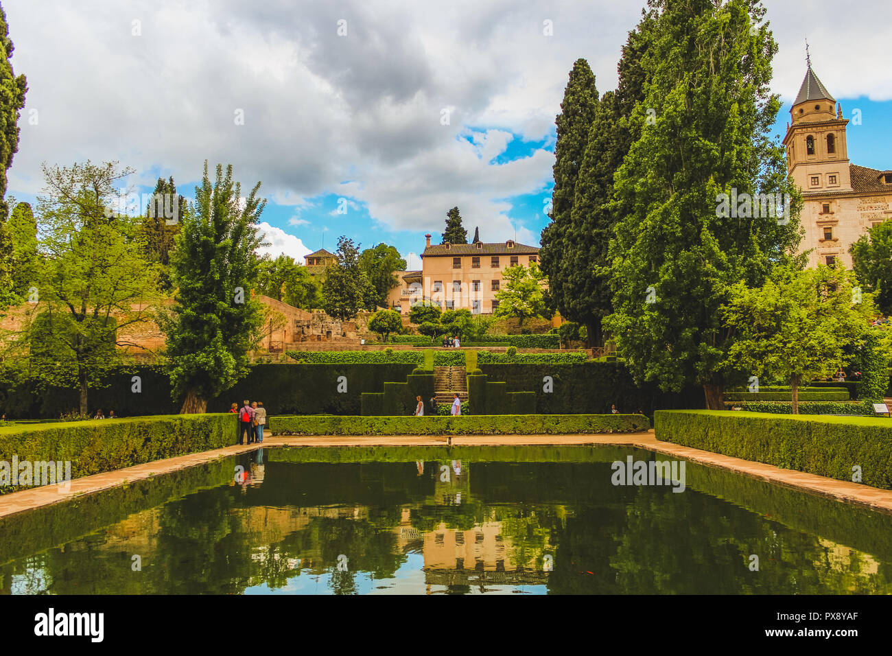 Building of moorish architecture, with a pond / lake, beautiful columns ...