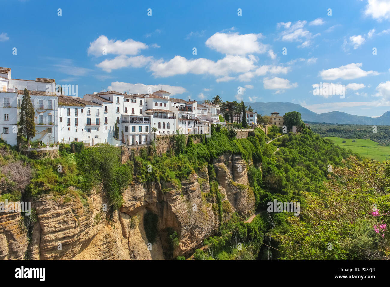 Houses built on the cliffs of beautiful Ronda city, view from "Puente ...