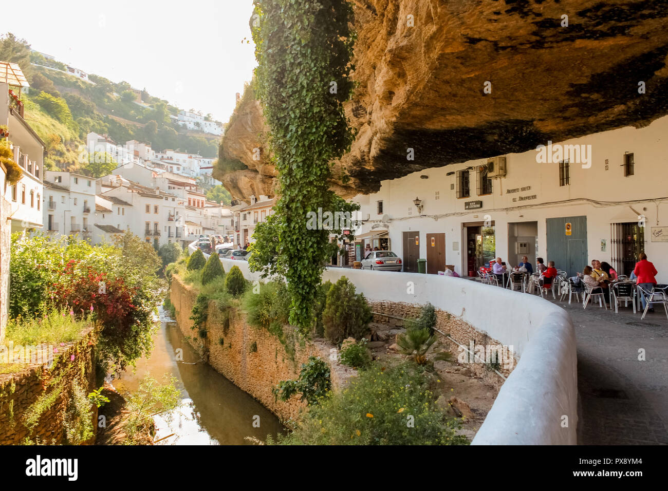 Buildings constructed under big rock natural formations in Setenil de ...