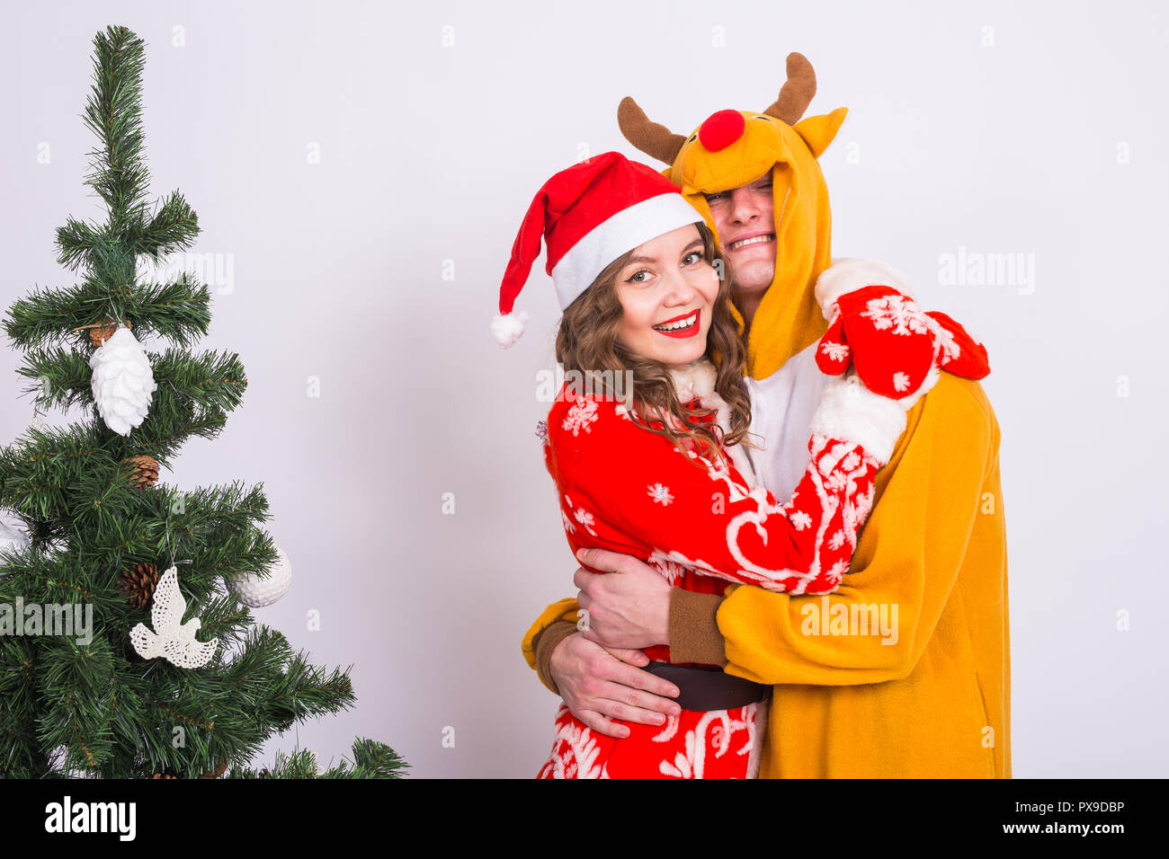 Holidays, christmas and emotions concept - lovely couple in christmas ...