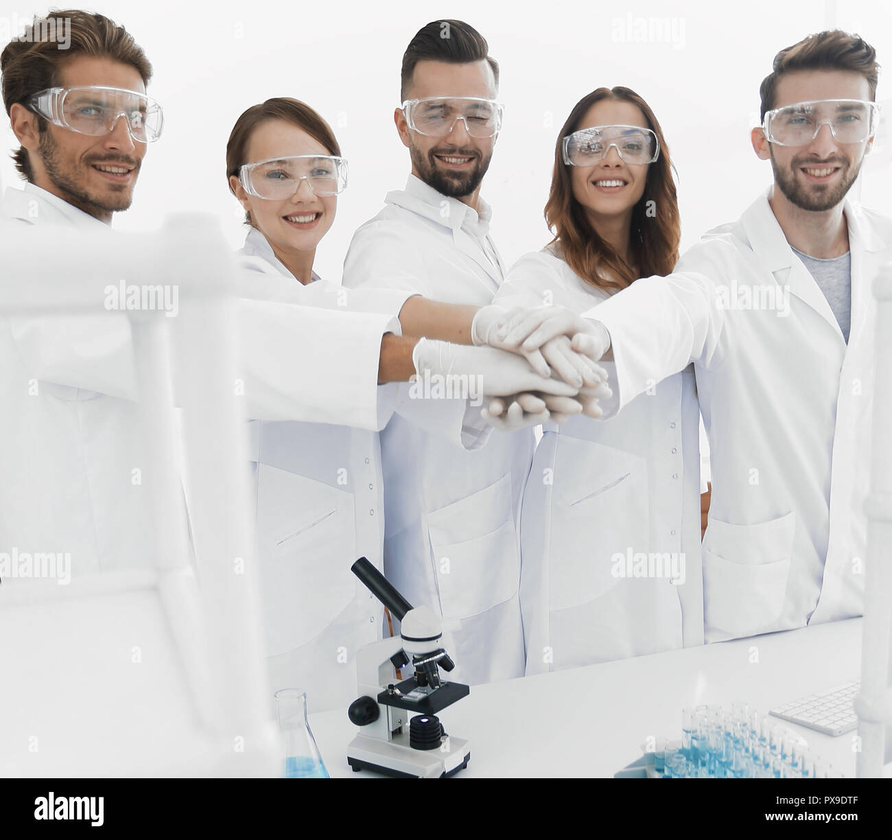 creative team of young scientists Stock Photo - Alamy