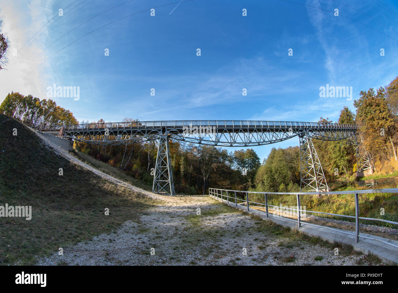 A bridge over a river built from a truss. Bridge, truss joined by ...