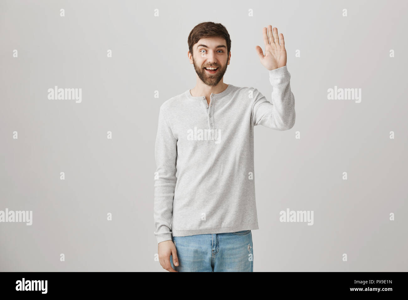 Worker waving hi-res stock photography and images - Alamy