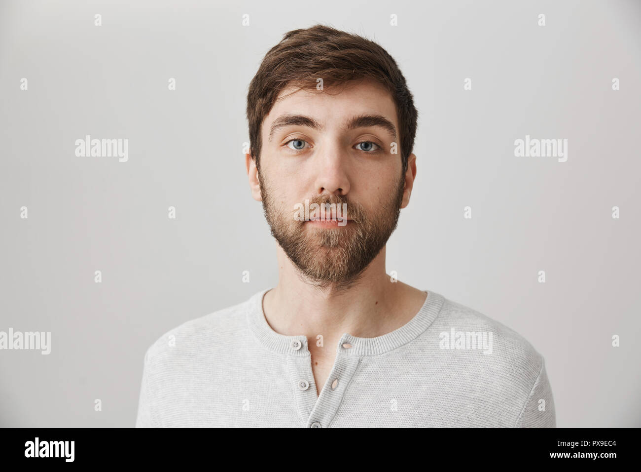 Keep calm and pretend nothing happened. Portrait of calm serious mature ...