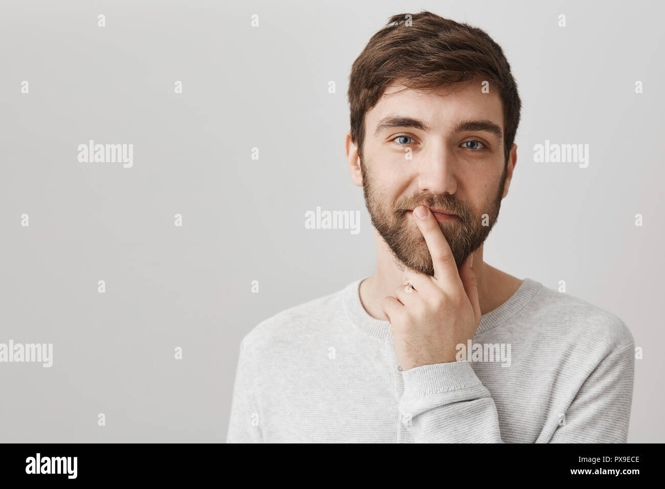 Finger over lip hi-res stock photography and images - Alamy