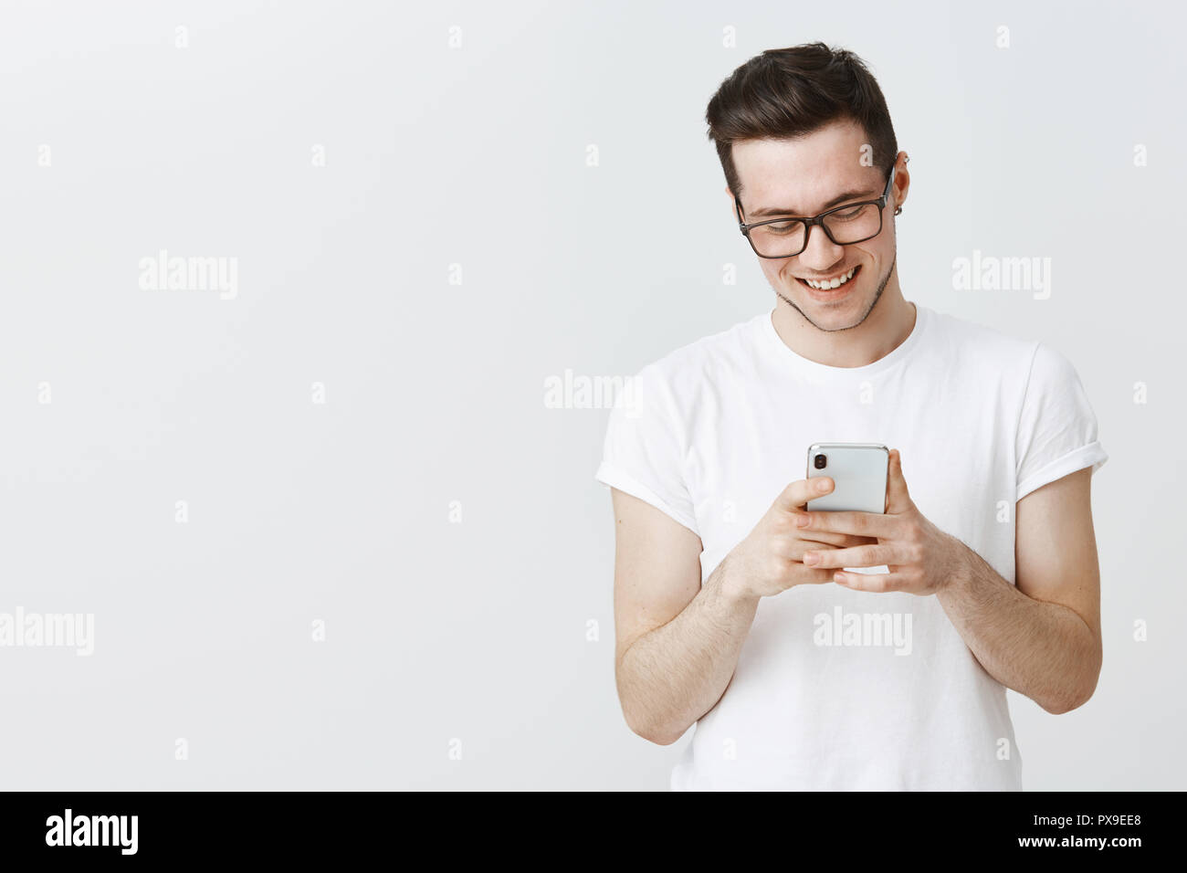 Portrait man in glasses reacting hi-res stock photography and images ...