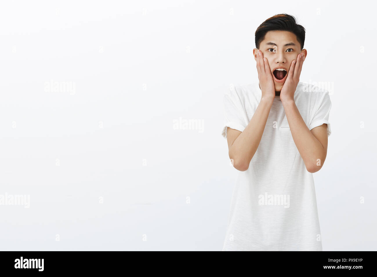 Pressing cheeks hi-res stock photography and images - Alamy