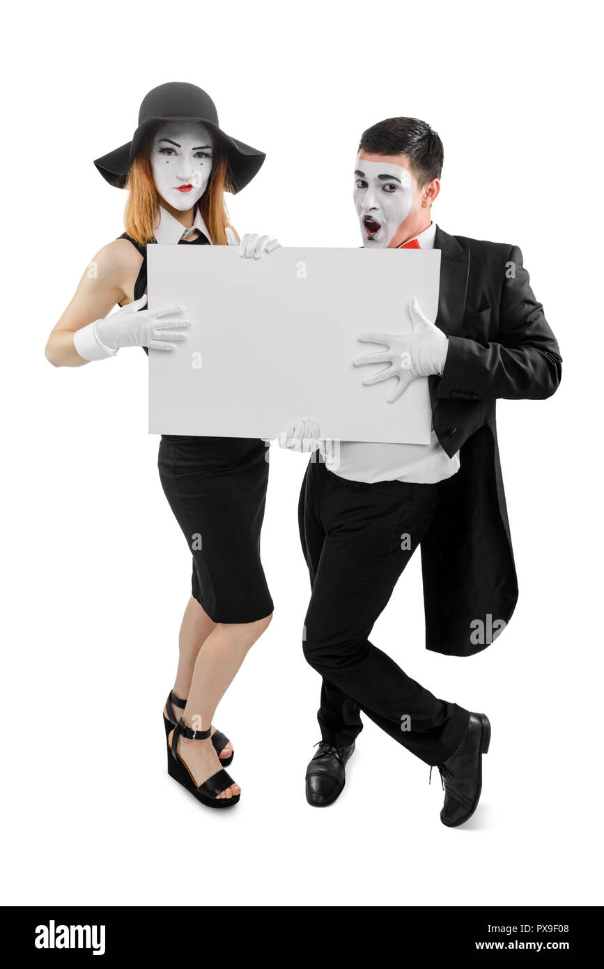 Two mimes holding blank canvas Stock Photo - Alamy