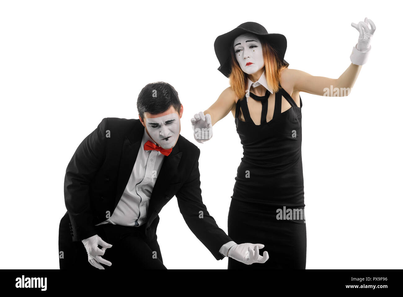 Two mimes playing music instruments Stock Photo - Alamy