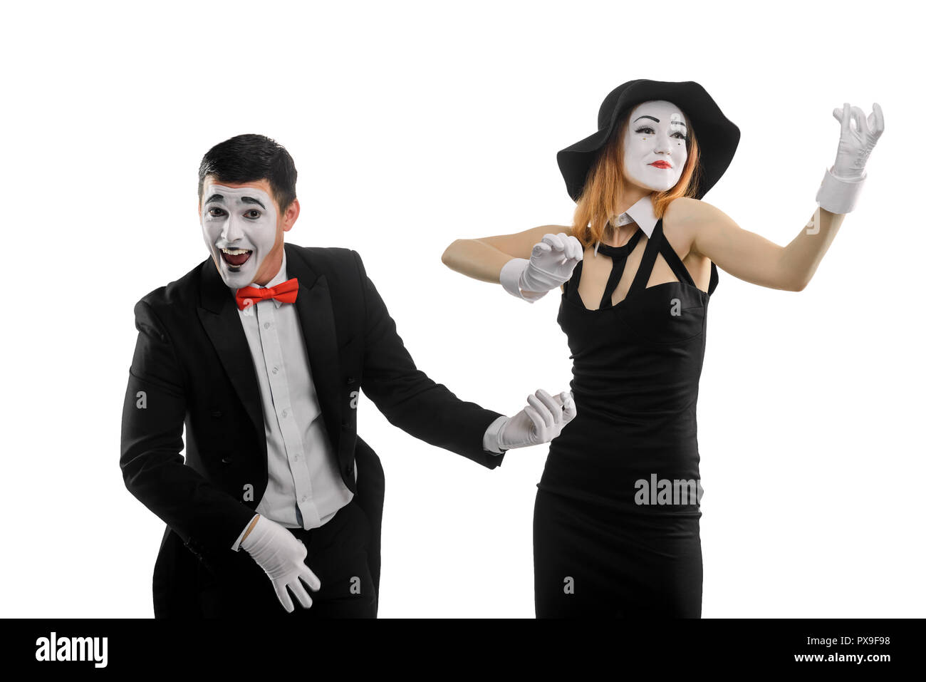 Mimes playing imaginary music instruments Stock Photo - Alamy