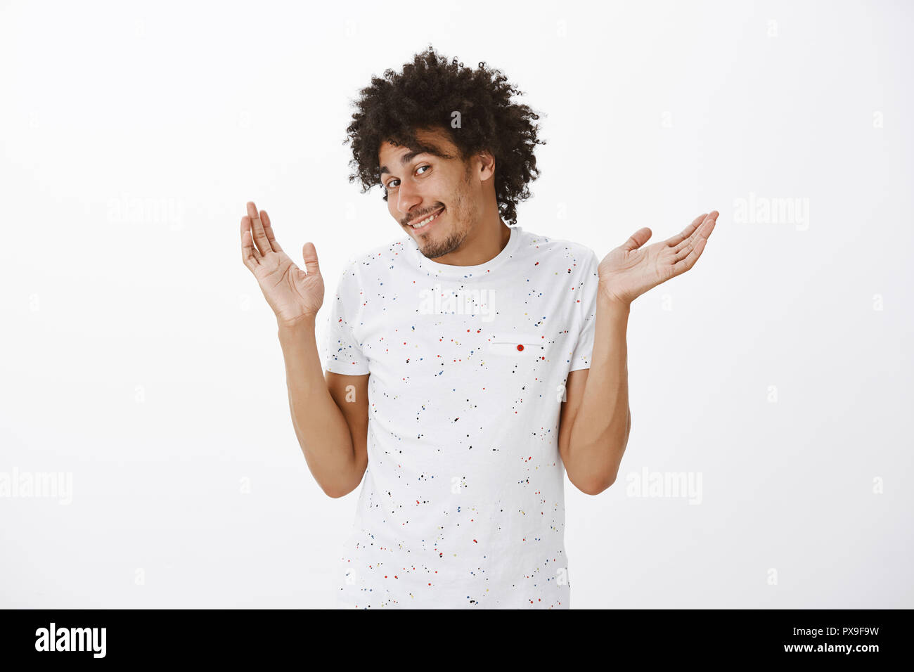 Not my problem. Portrait of careless and indifferent cute happy guy ...