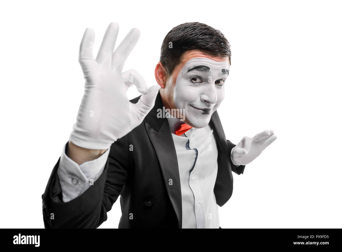 Mime actor showing OK sign Stock Photo - Alamy