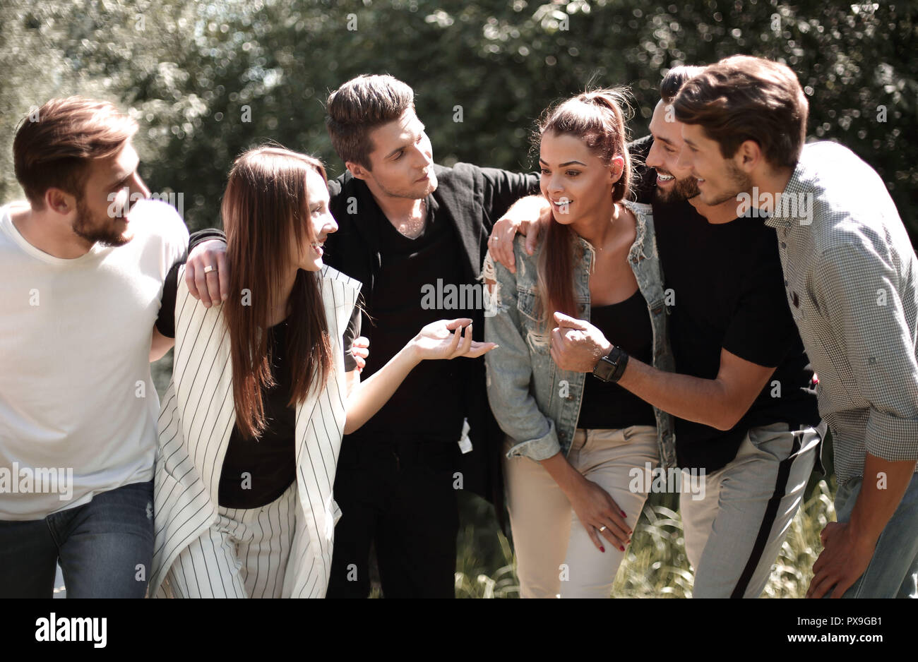 group of young people are discussing something Stock Photo - Alamy