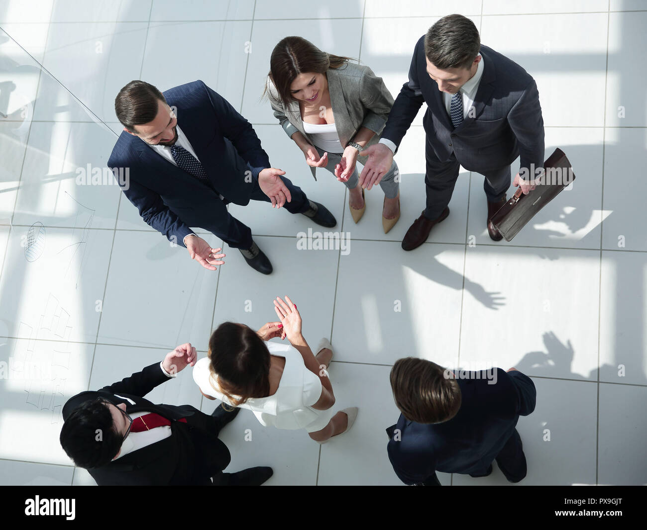 top view. employees discussing important issue Stock Photo - Alamy