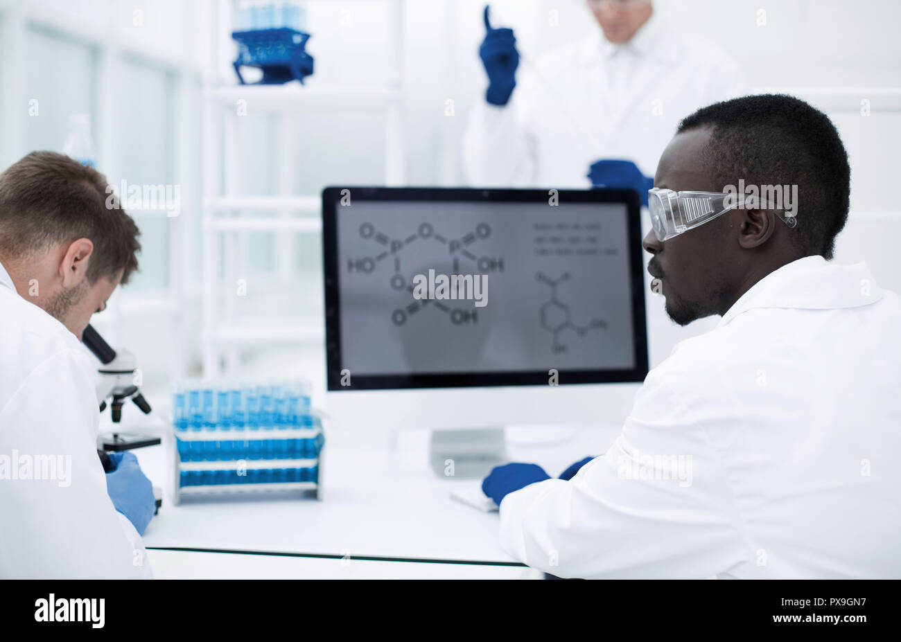 group of scientists in a modern laboratory Stock Photo - Alamy