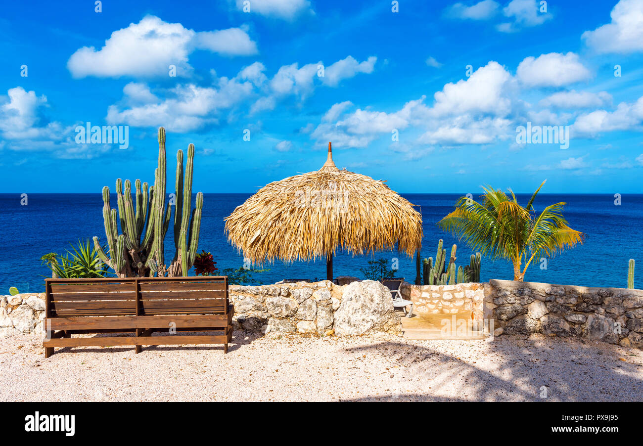 Wooden bench on the background of the sea landscape in Playa Lagoon ...