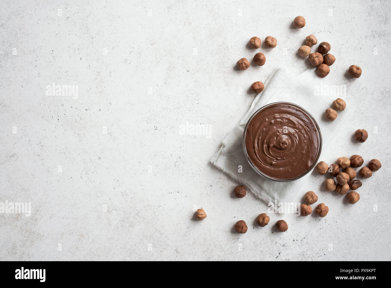 Chocolate Hazelnut Spread on white background, top view, copy space ...