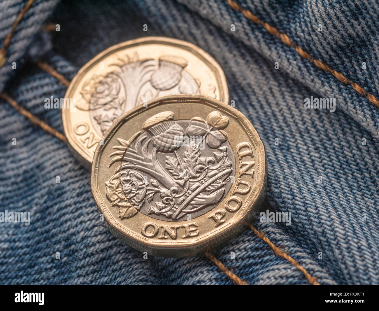 New Pound coin and trouser pocket. Metaphor for 'The Pound in Your ...