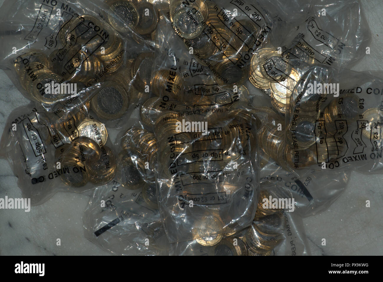 Full of british one pound coins hi-res stock photography and images - Alamy