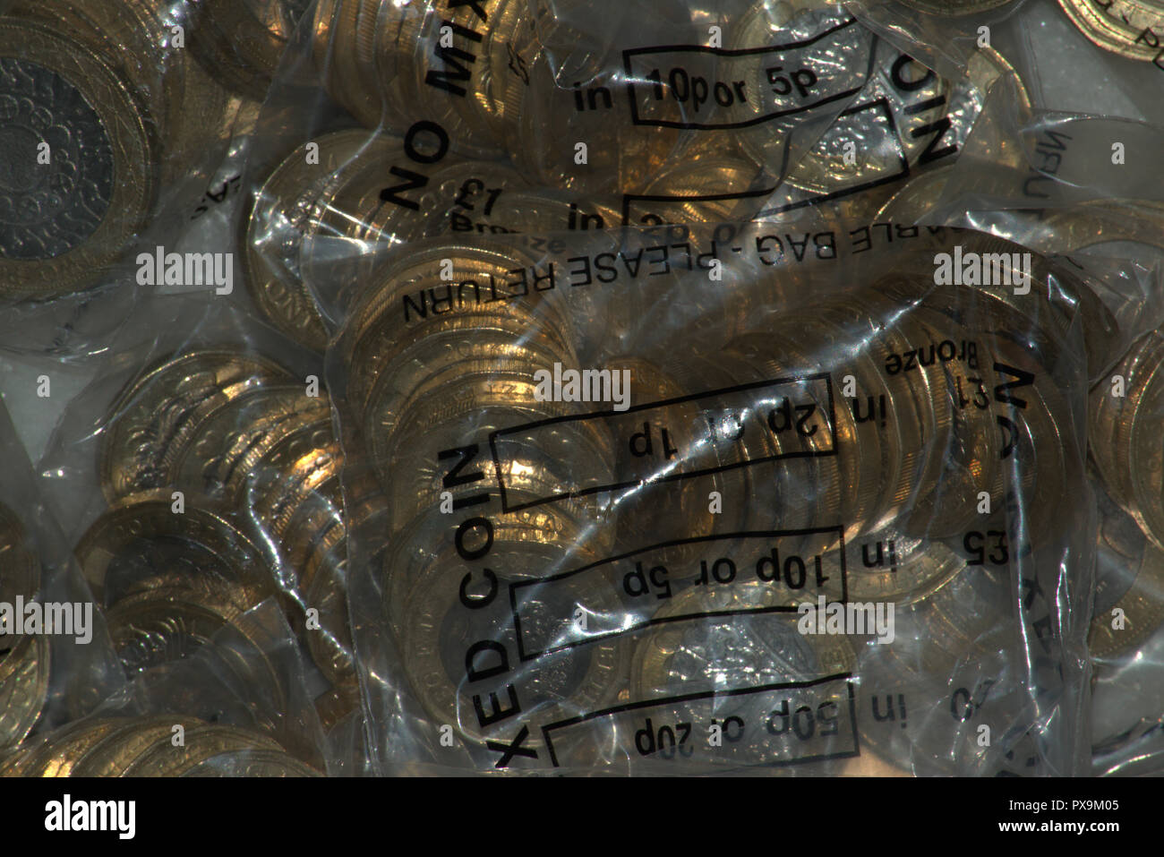 Full of british one pound coins hi-res stock photography and images - Alamy